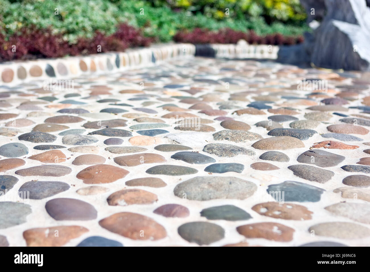 stone round about pavement roadway stone round about shine shines ...