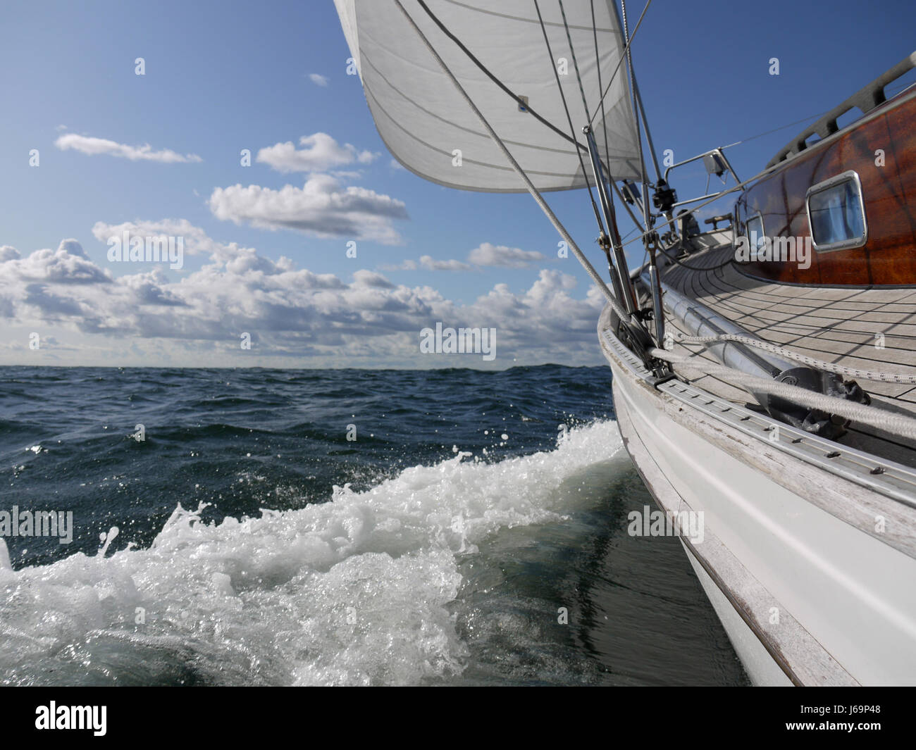 waves sail sailing boat sailboat spray salt water sea ocean water blue ...
