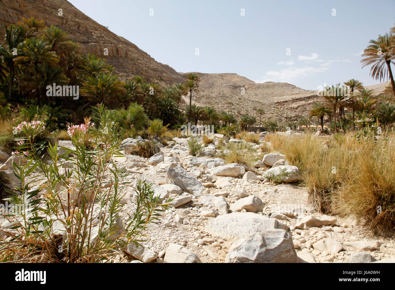 arabia oman wadi scenery countryside nature stones mountains horizon ...