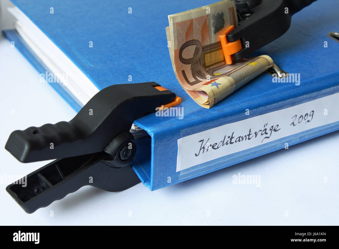 blue file financing clamp jam blue bank notes current symbol picture ...