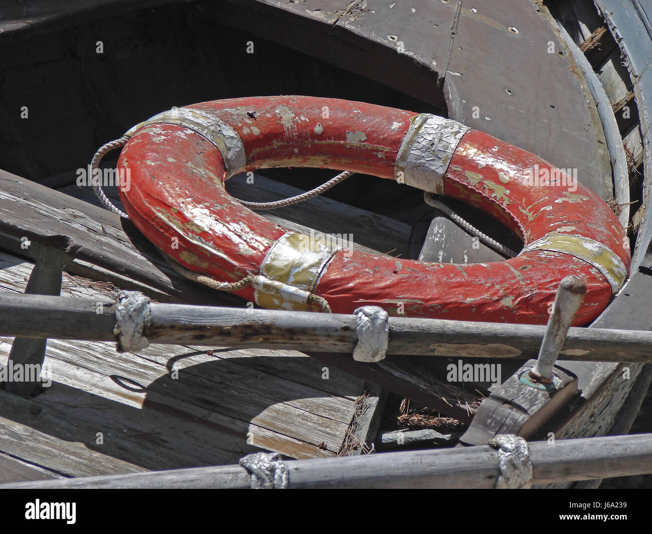 lifebuoy in the wooden boat Stock Photo - Alamy