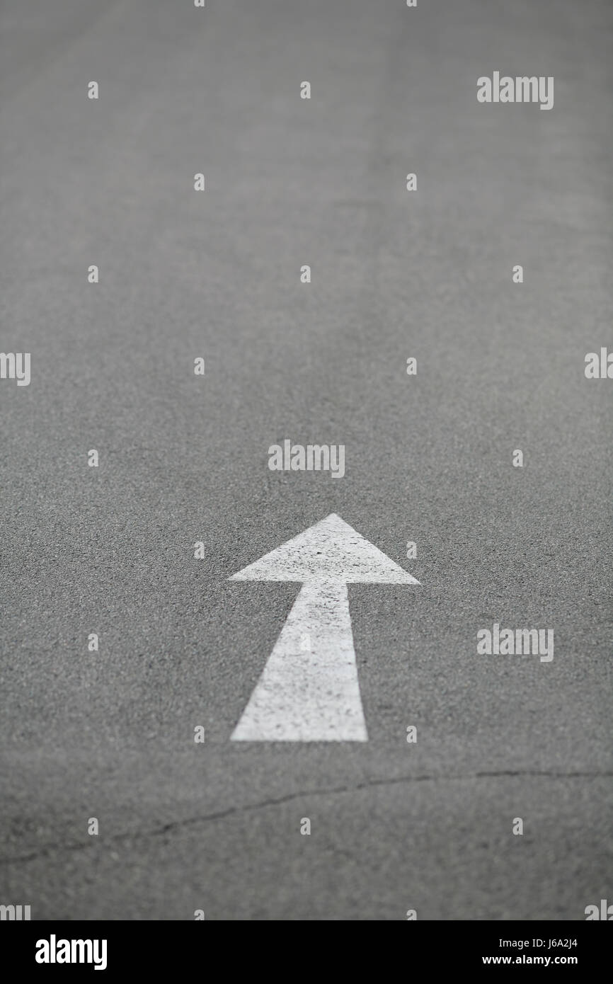 Road marking shows arrow hi-res stock photography and images - Alamy