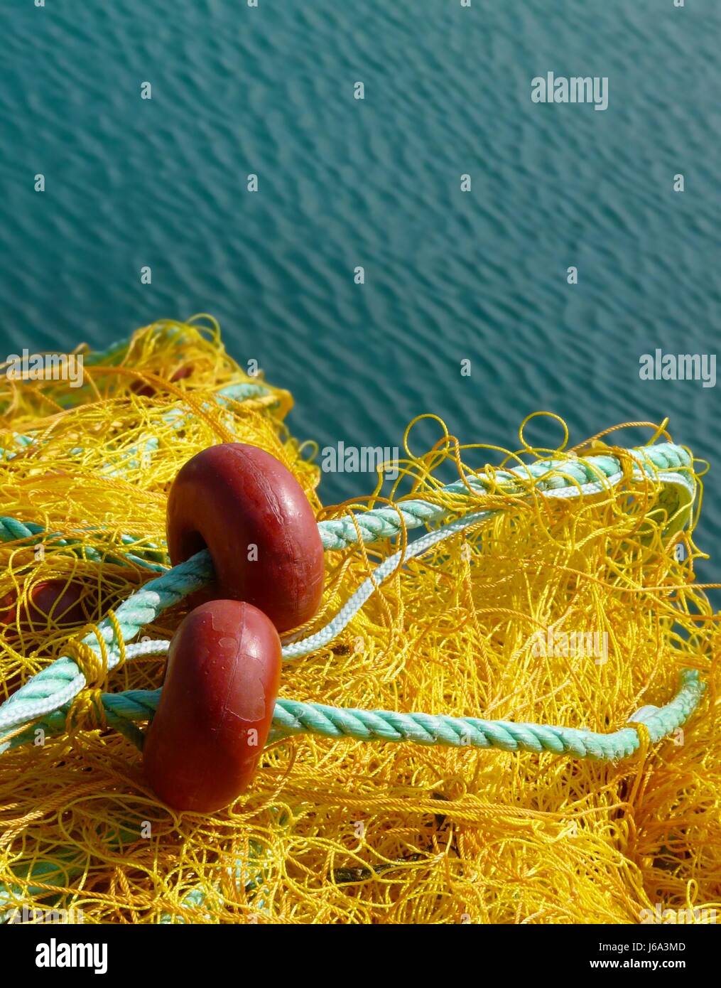 Fishing nets with weights hi-res stock photography and images - Alamy