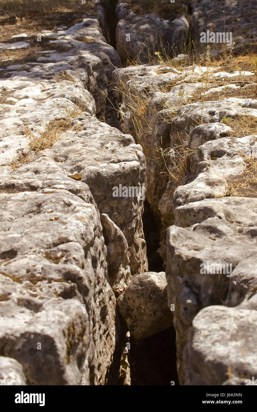 rock crack fissure big large enormous extreme powerful imposing immense ...