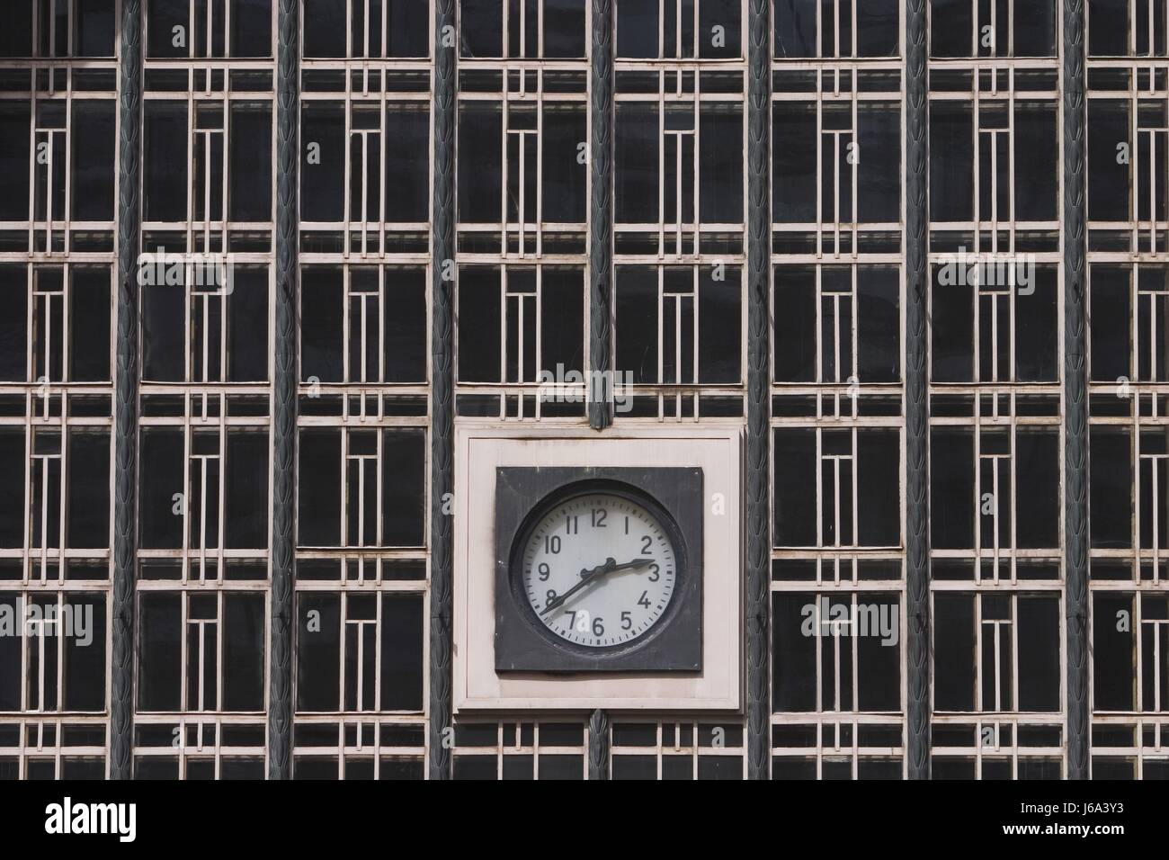 clock date time time indication office building office block block of ...