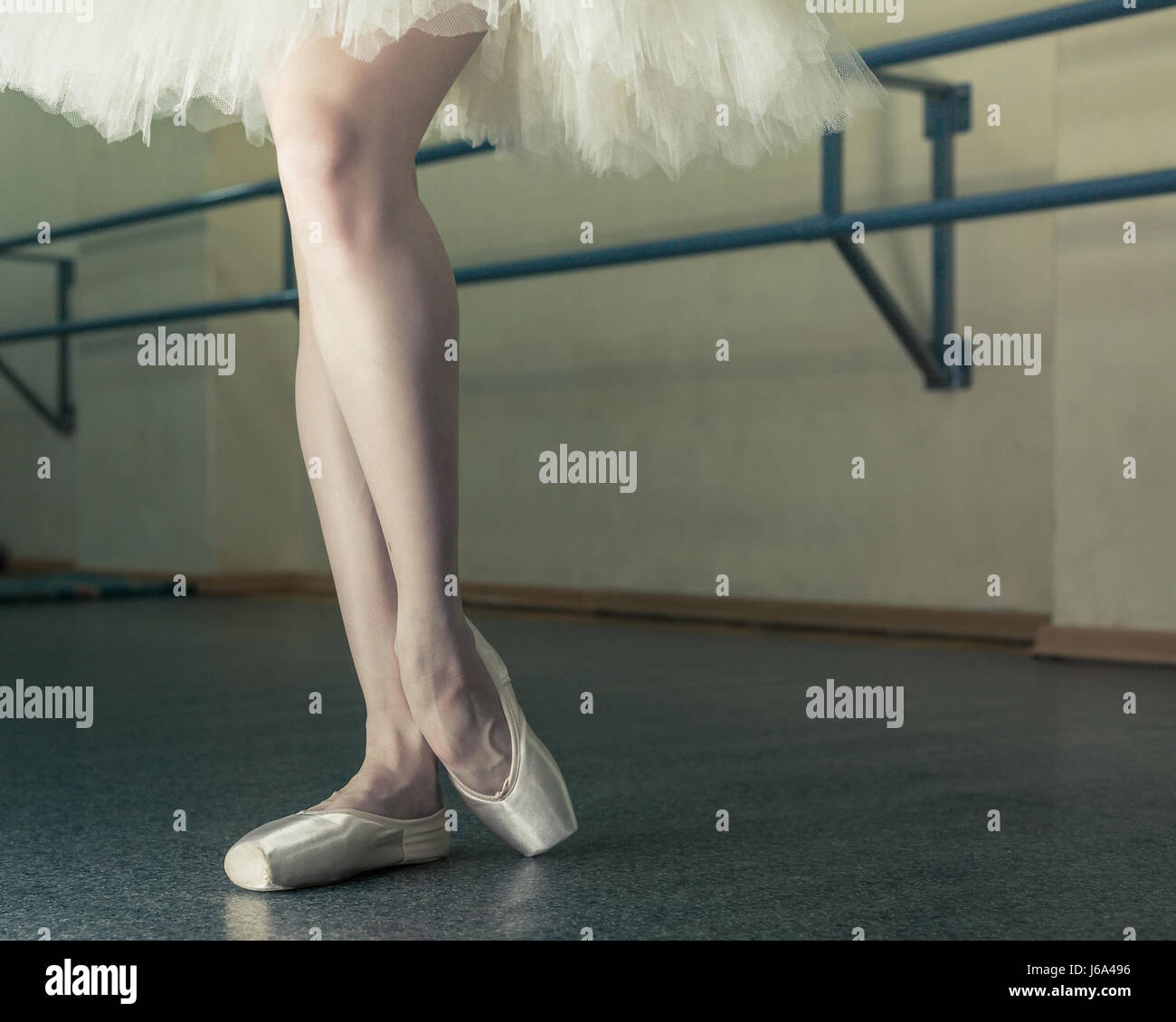 Ballerina in pointes and pack poses. Classical ballet. Prima ballerina ...