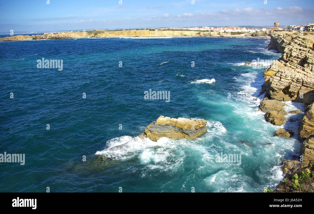 blue portugal wave salt water sea ocean water rock blue humans human ...