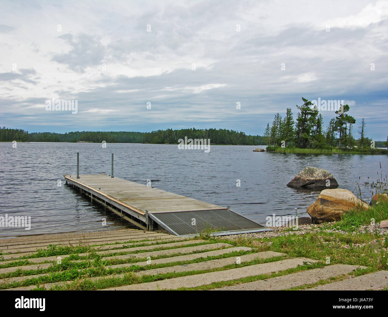 blue dock boat fresh water lake inland water water firmament sky rowing ...