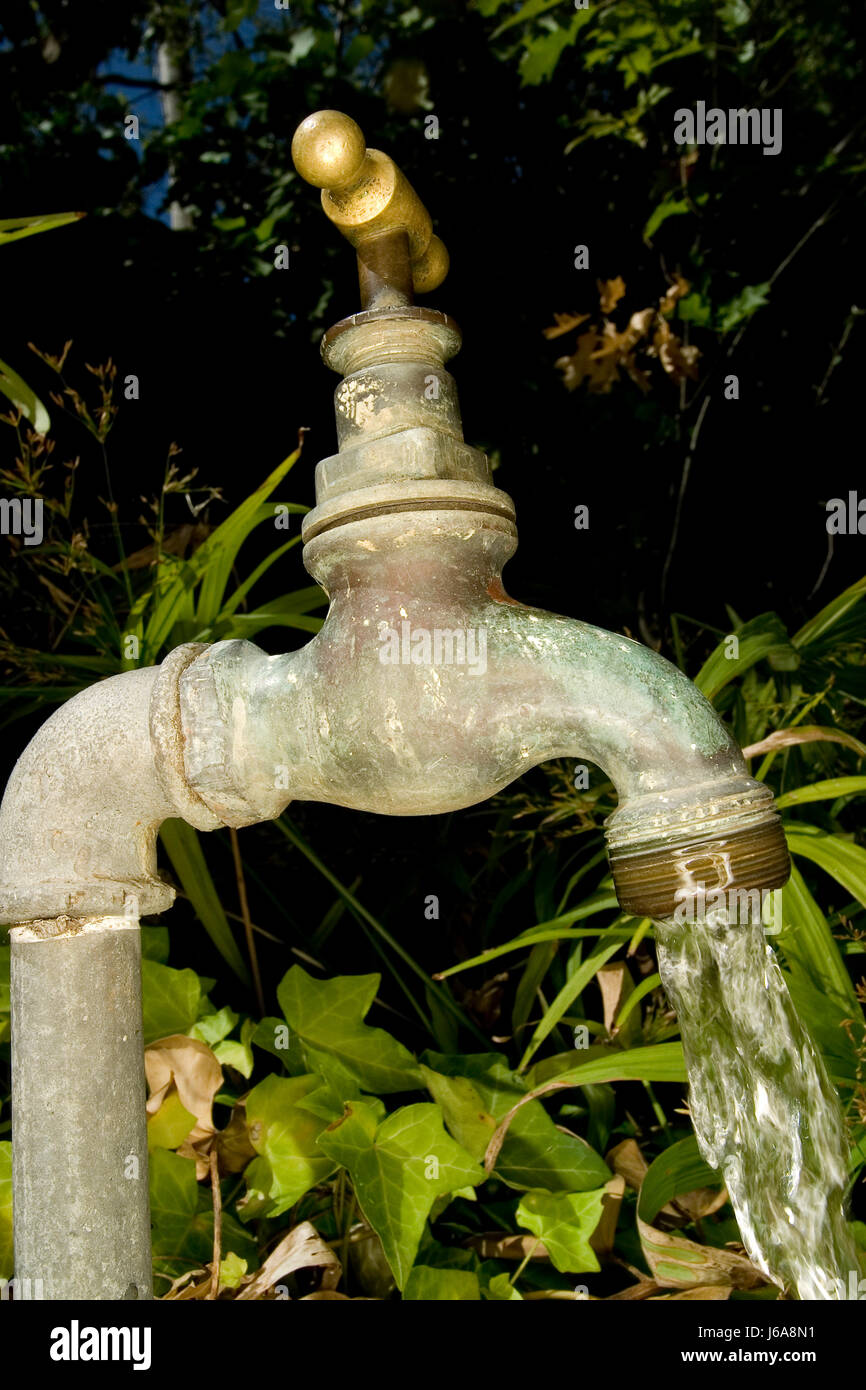 environment enviroment garden drought wet waste squandering water tap ...