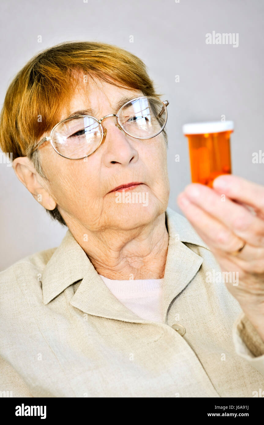 woman pills drugs elderly healthcare senior senior citizen elderly ...