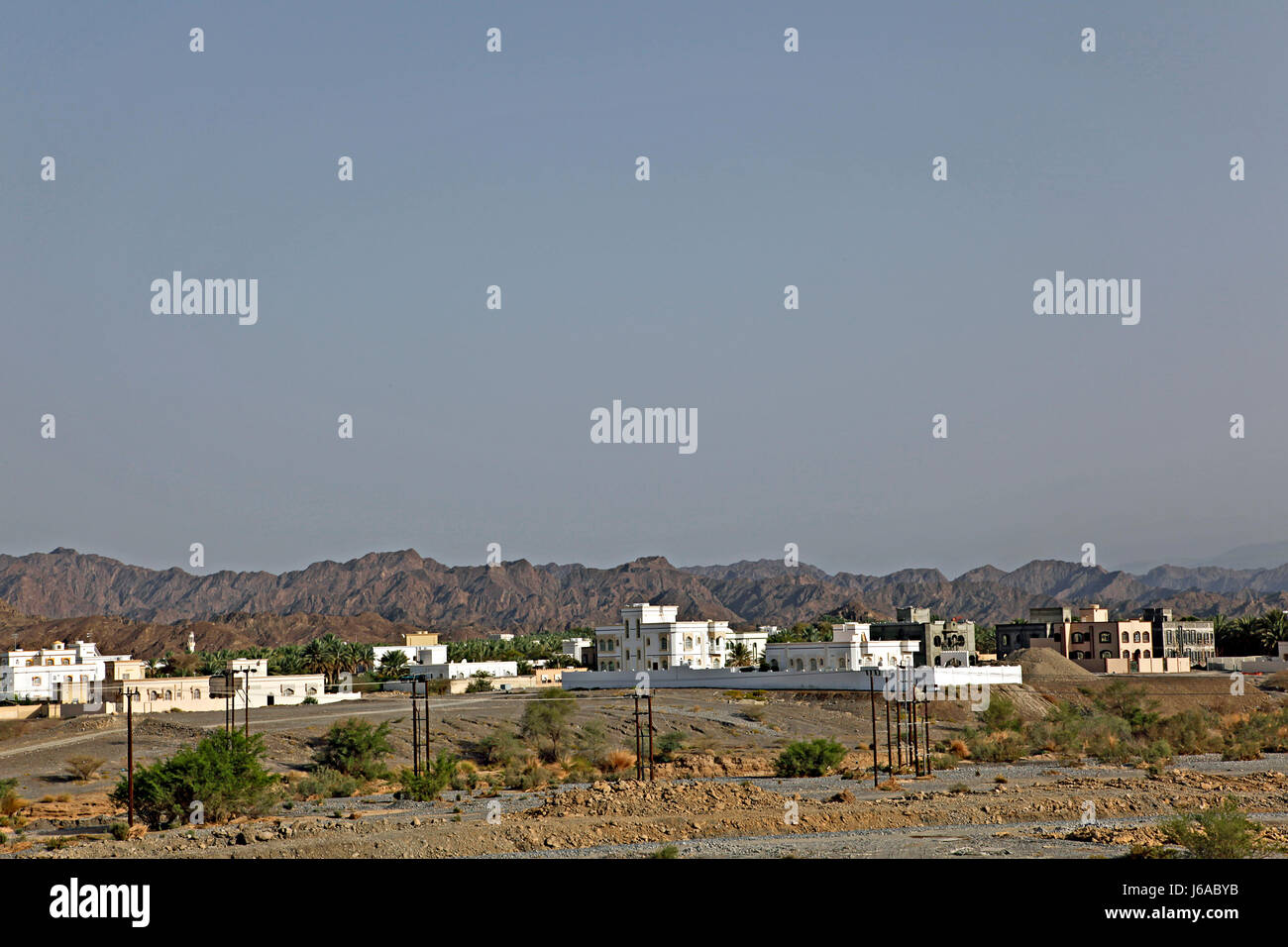 city town arabia oman mountains horizon desert wasteland wall dryness ...