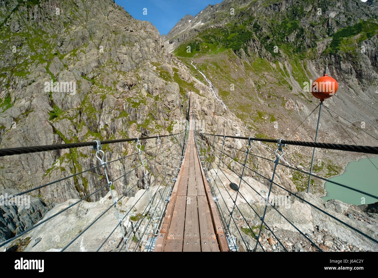 alps switzerland rock suspension bridge ravine high pressure area ...