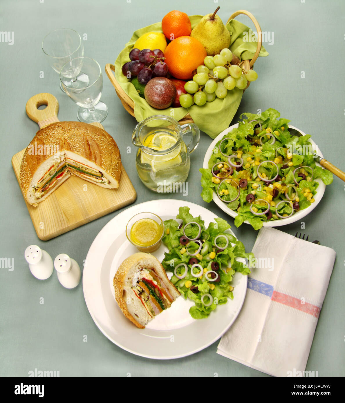 bread salad orange bread salt pepper glasses grapes basket fruit ...