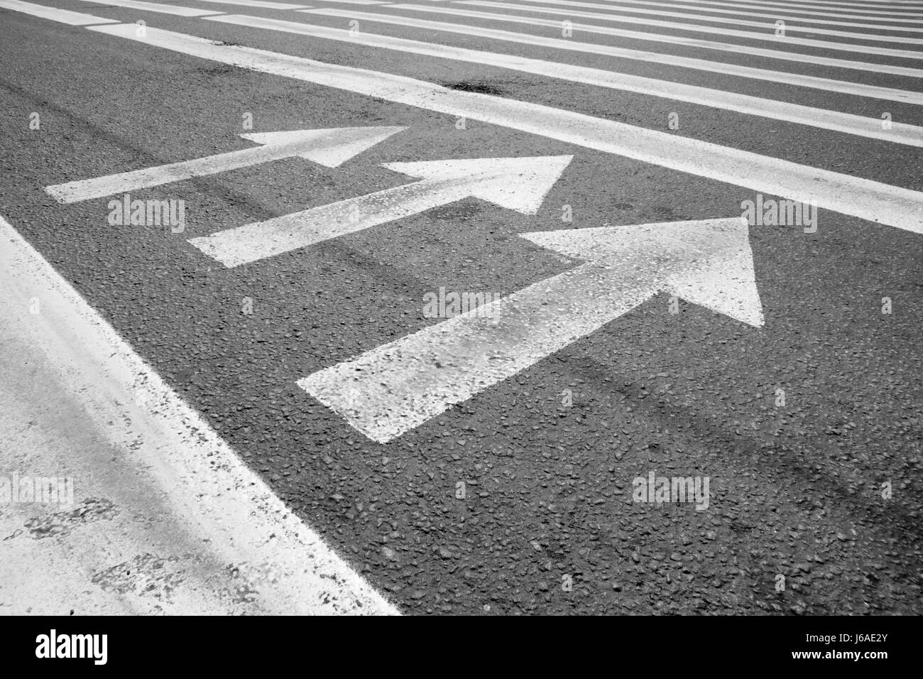 Pavement marking arrow Black and White Stock Photos & Images - Alamy