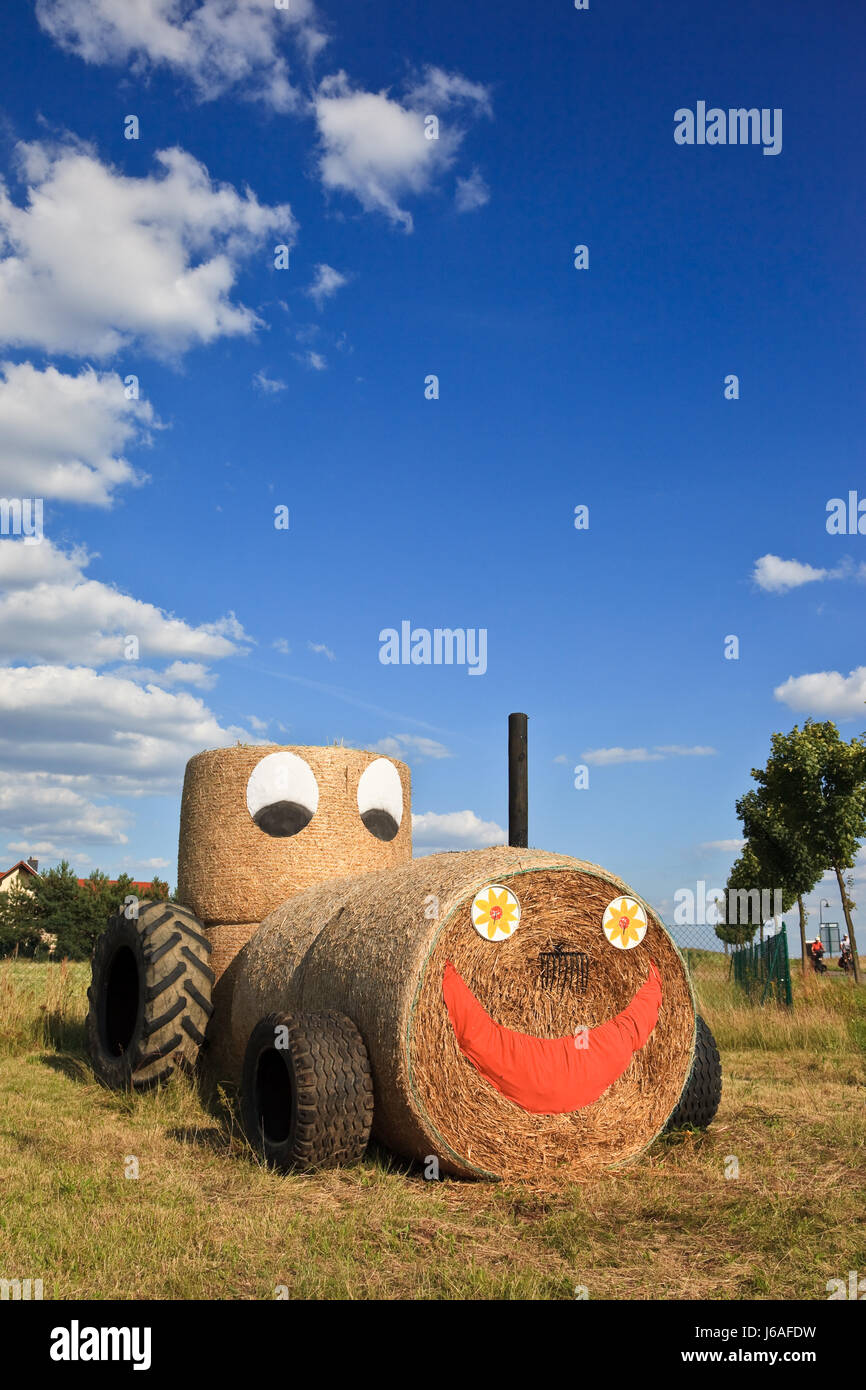 straw bale tractor Stock Photo - Alamy