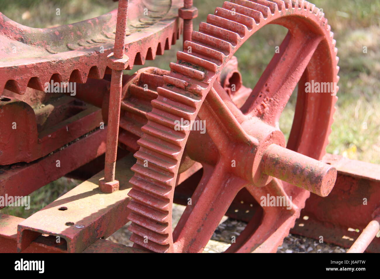red gear in closeup Stock Photo - Alamy