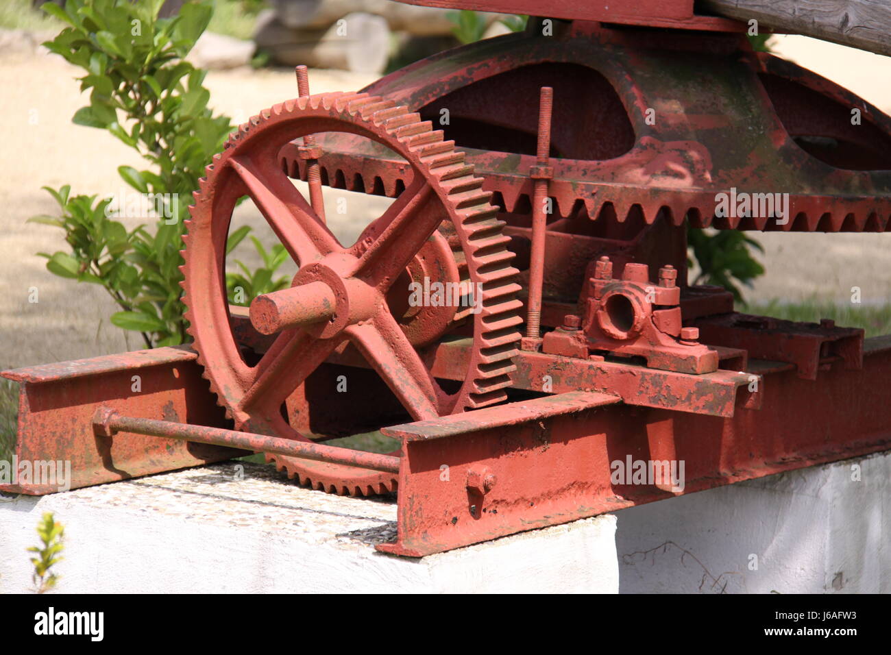 red gears in close-up Stock Photo - Alamy