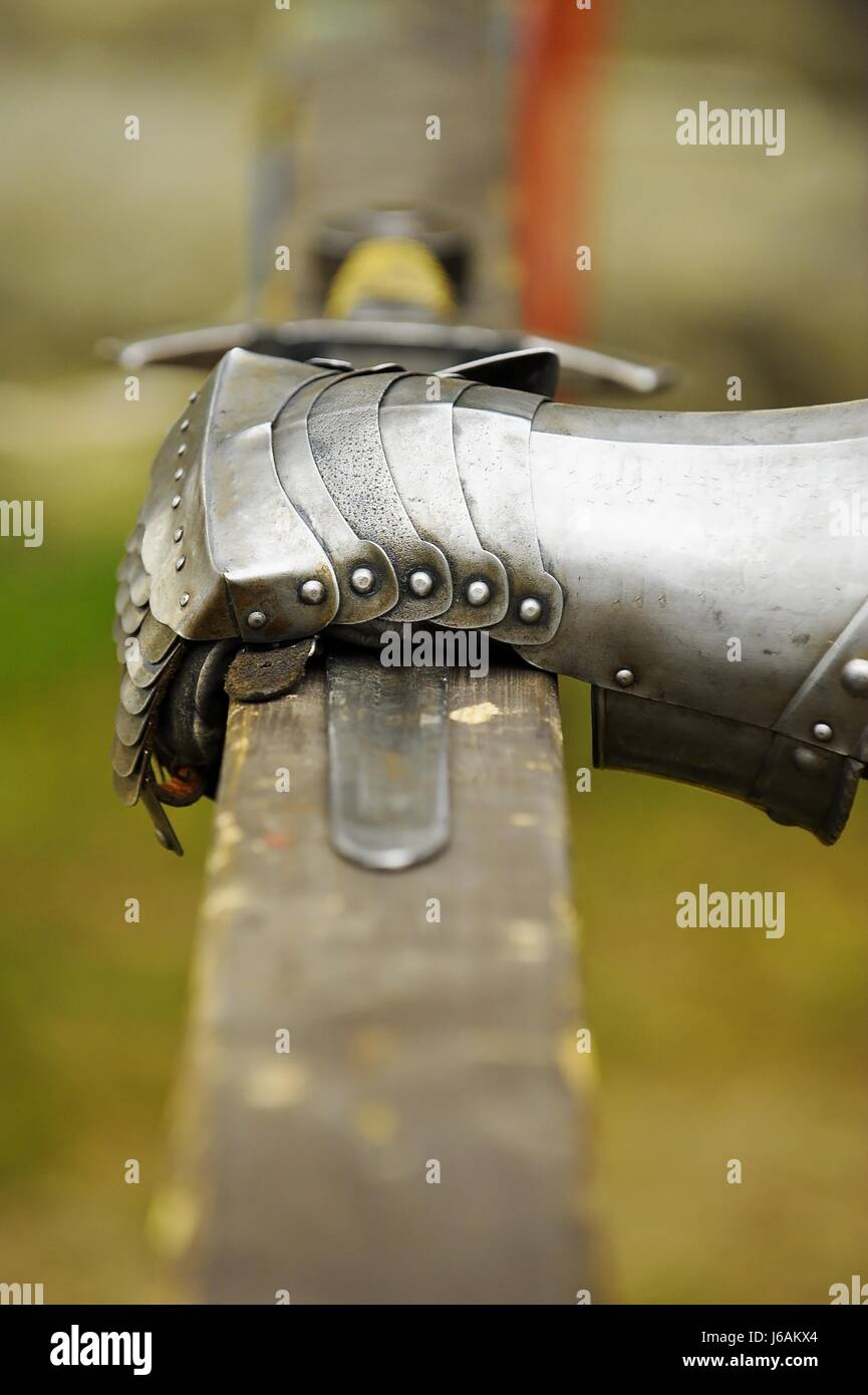 hand lie lying lies glove power knight sword arm weapon strength force ...