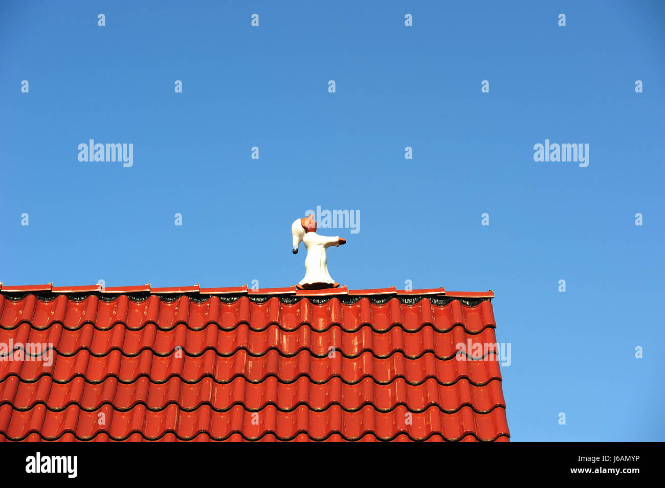 Man on a roof hi-res stock photography and images - Alamy