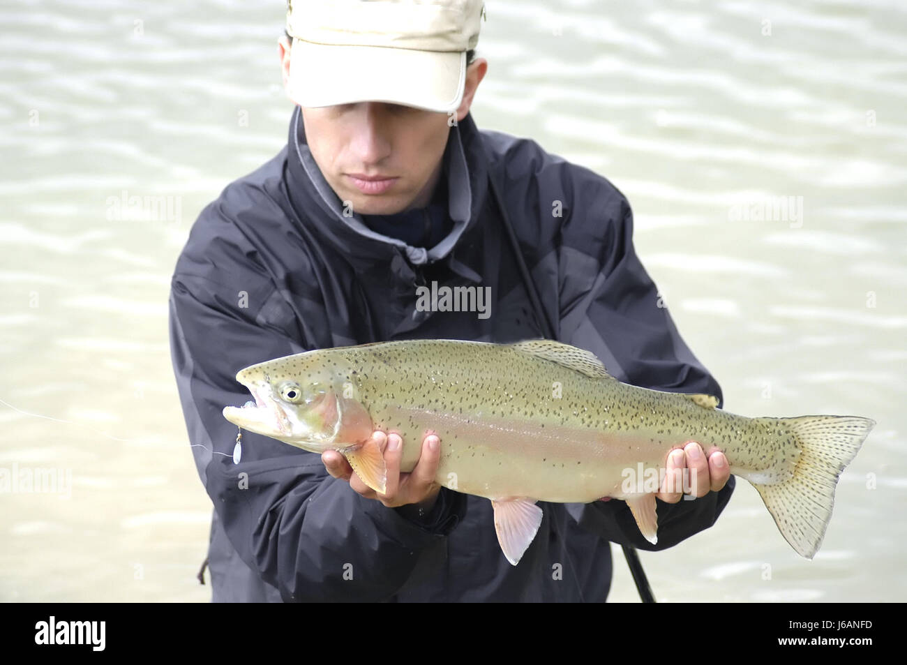 Male hands holding fresh caught hi-res stock photography and images - Alamy