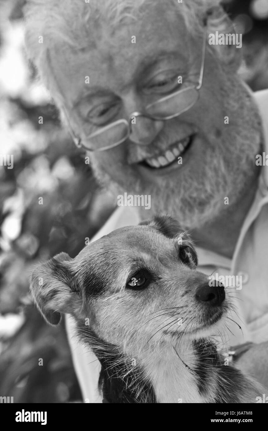 Sitting man dog Black and White Stock Photos & Images - Alamy