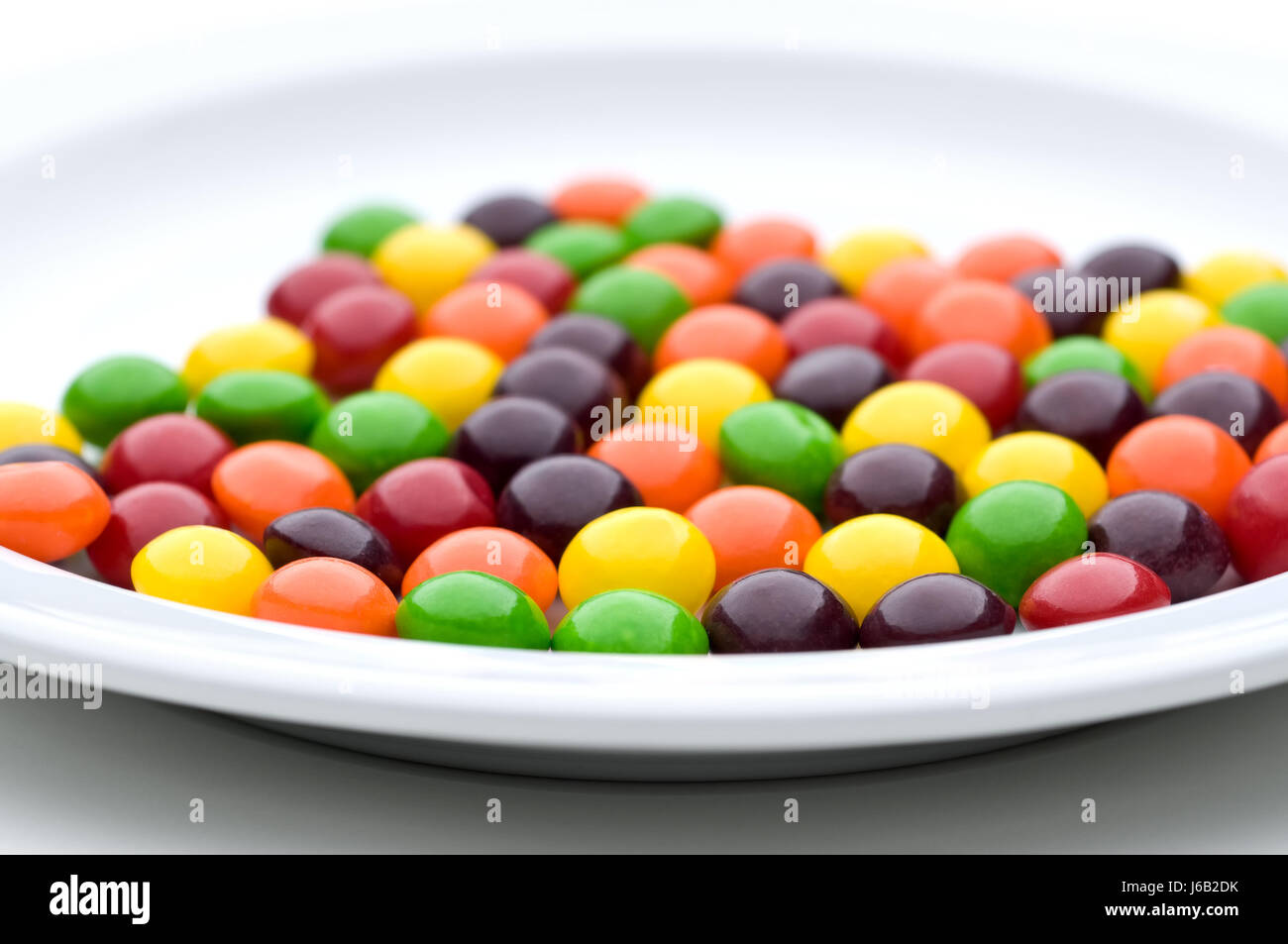 food aliment sweet plate hard candies treat colors colours heavy sweet ...