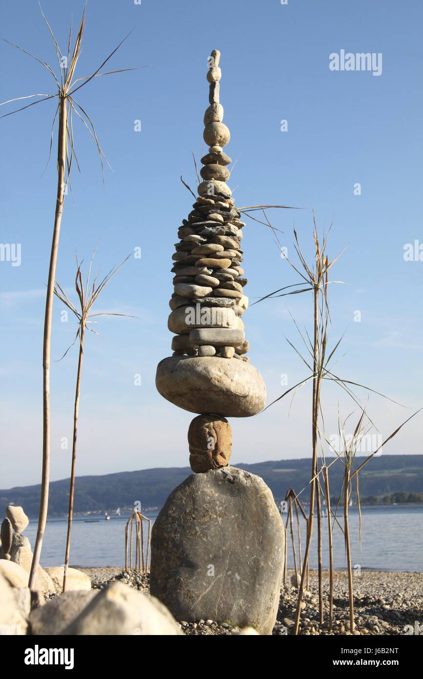 balance equilibrium silicic pebbles stability stones tower stone beach seaside Stock Photo - Alamy
