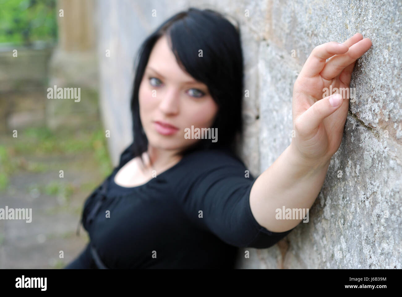 woman sad longing wall loneliness sadness alone lonely teens teenagers youth Stock Photo - Alamy