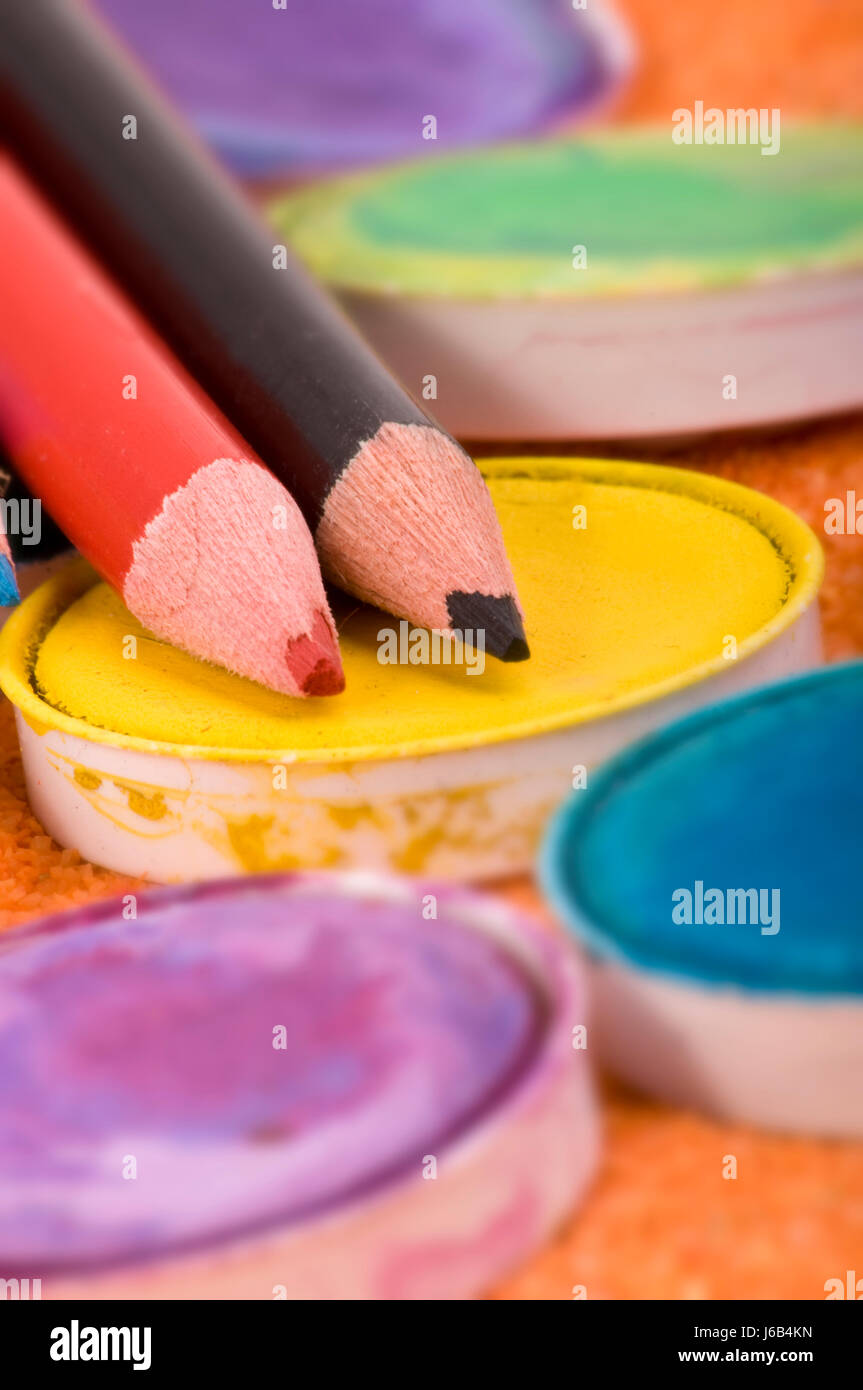 crayons and paint pots Stock Photo - Alamy