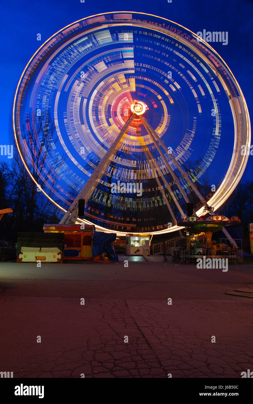 entertainment wheel night nighttime illumination color blur paint ...