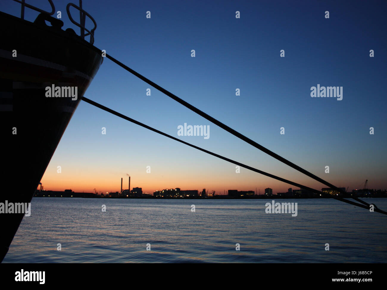 sunset harbor counter-light evening light harbours amsterdam shine ...
