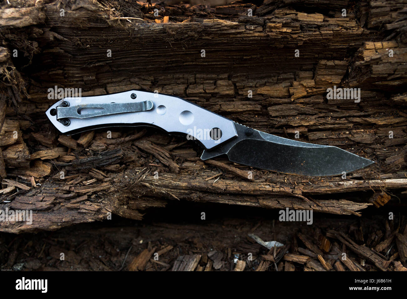 Black knife with gray handle Stock Photo - Alamy