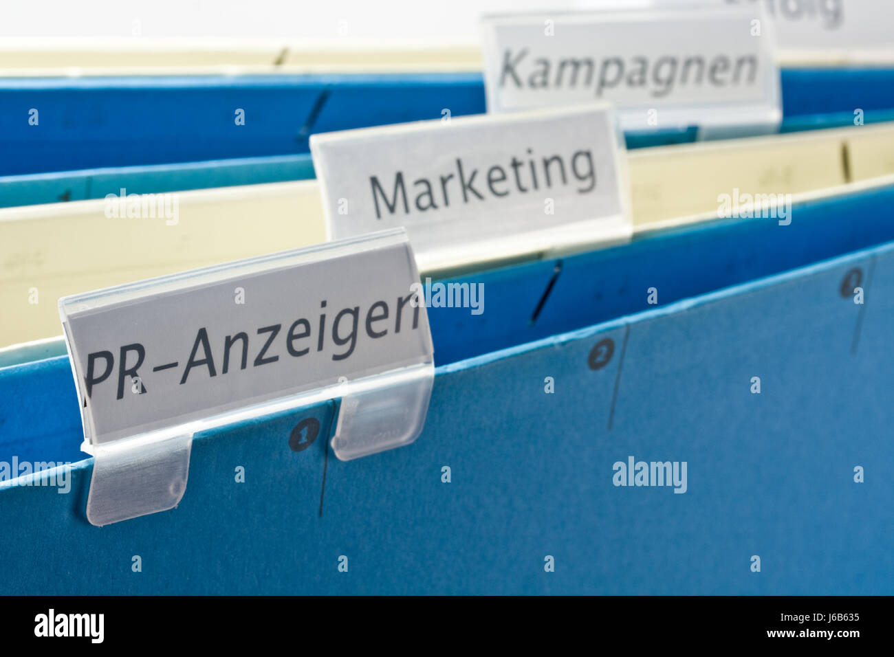 blue filing suspended pocket file blue business dealings deal business ...