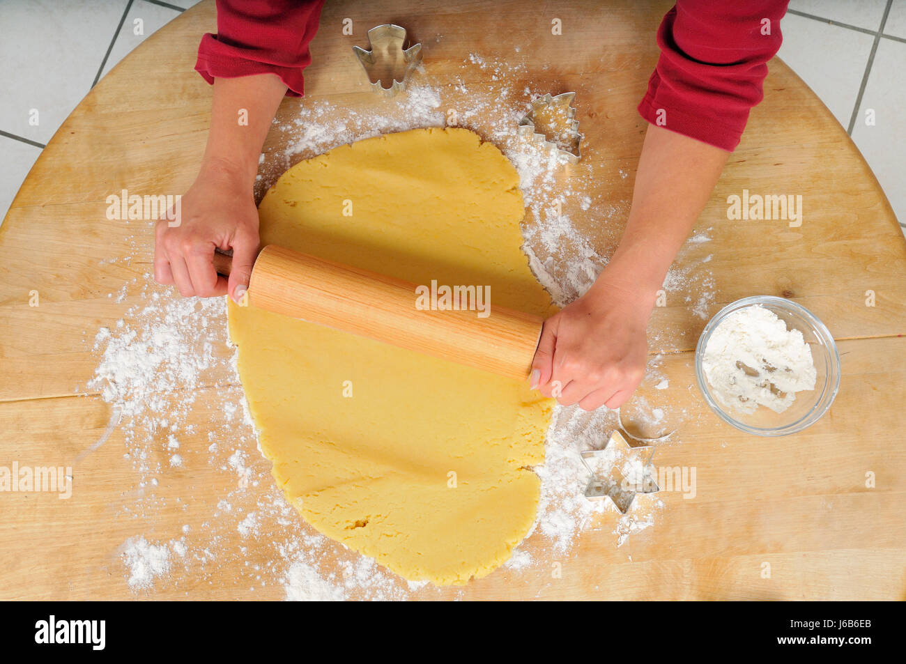 bake roll out dough woman aerial perspective hand hands person advent ...