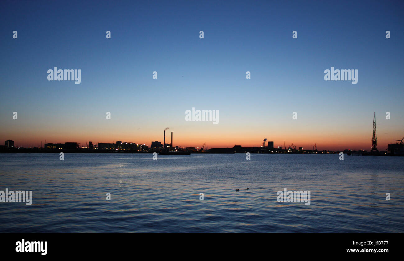 sunset harbor counter-light evening light harbours amsterdam shine ...