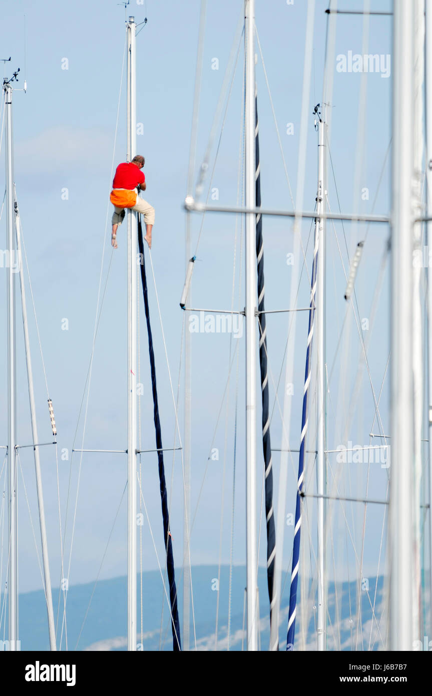 adjust mast sailing boat sailboat boat rigging seaman rowing boat ...