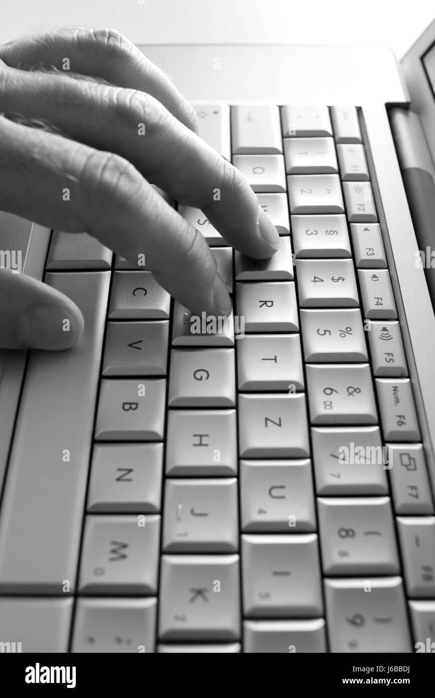 silver colored laptop Stock Photo - Alamy