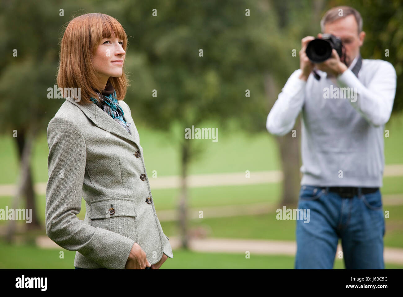 model and photographer working in the park Stock Photo - Alamy