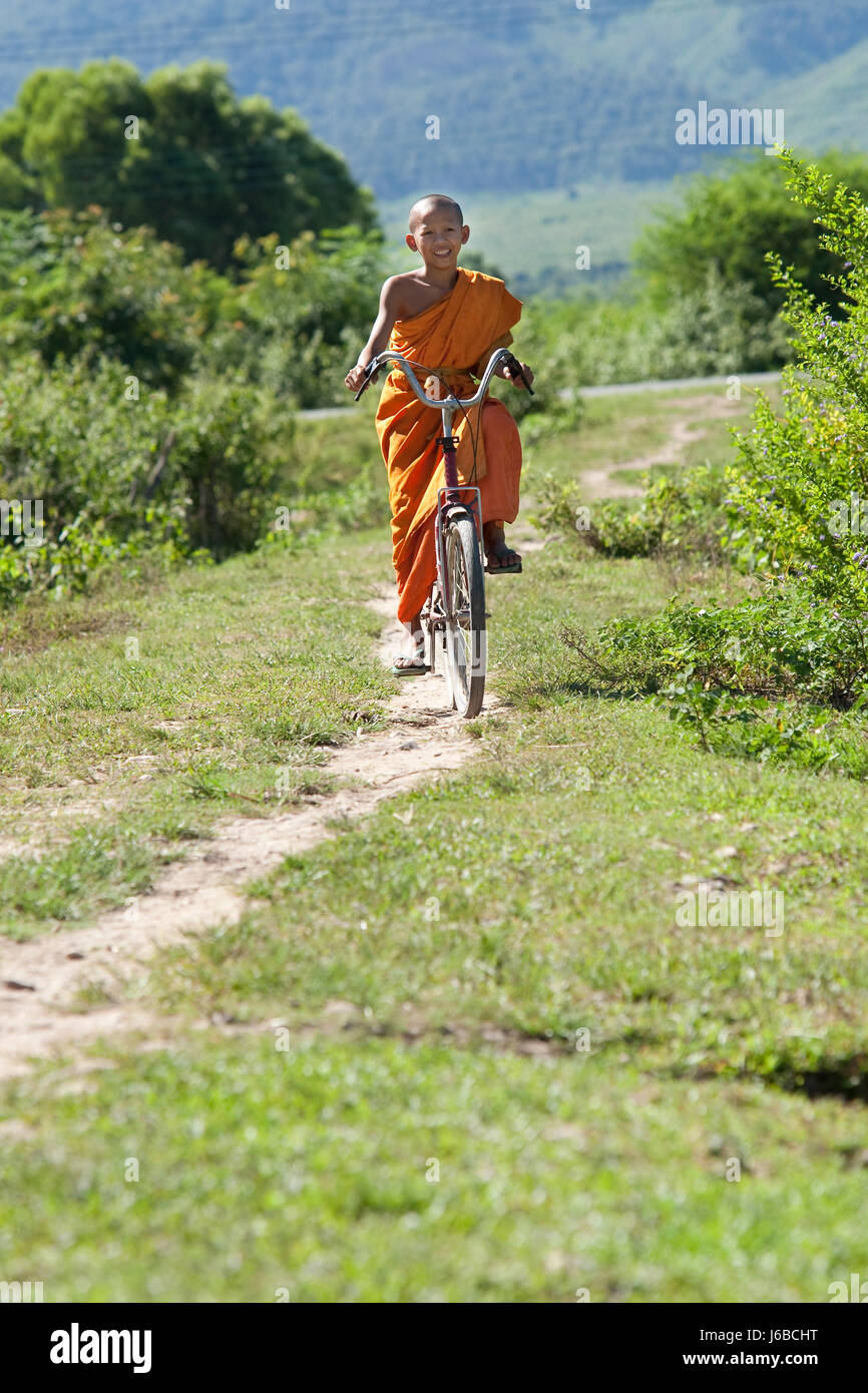 Novice buddhist monk boy cycle hi-res stock photography and images - Alamy