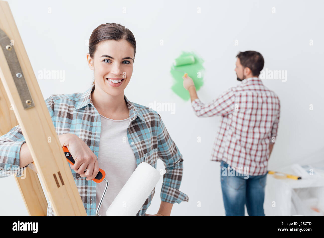 Home makeover and renovation: young couple redecorating their new house ...