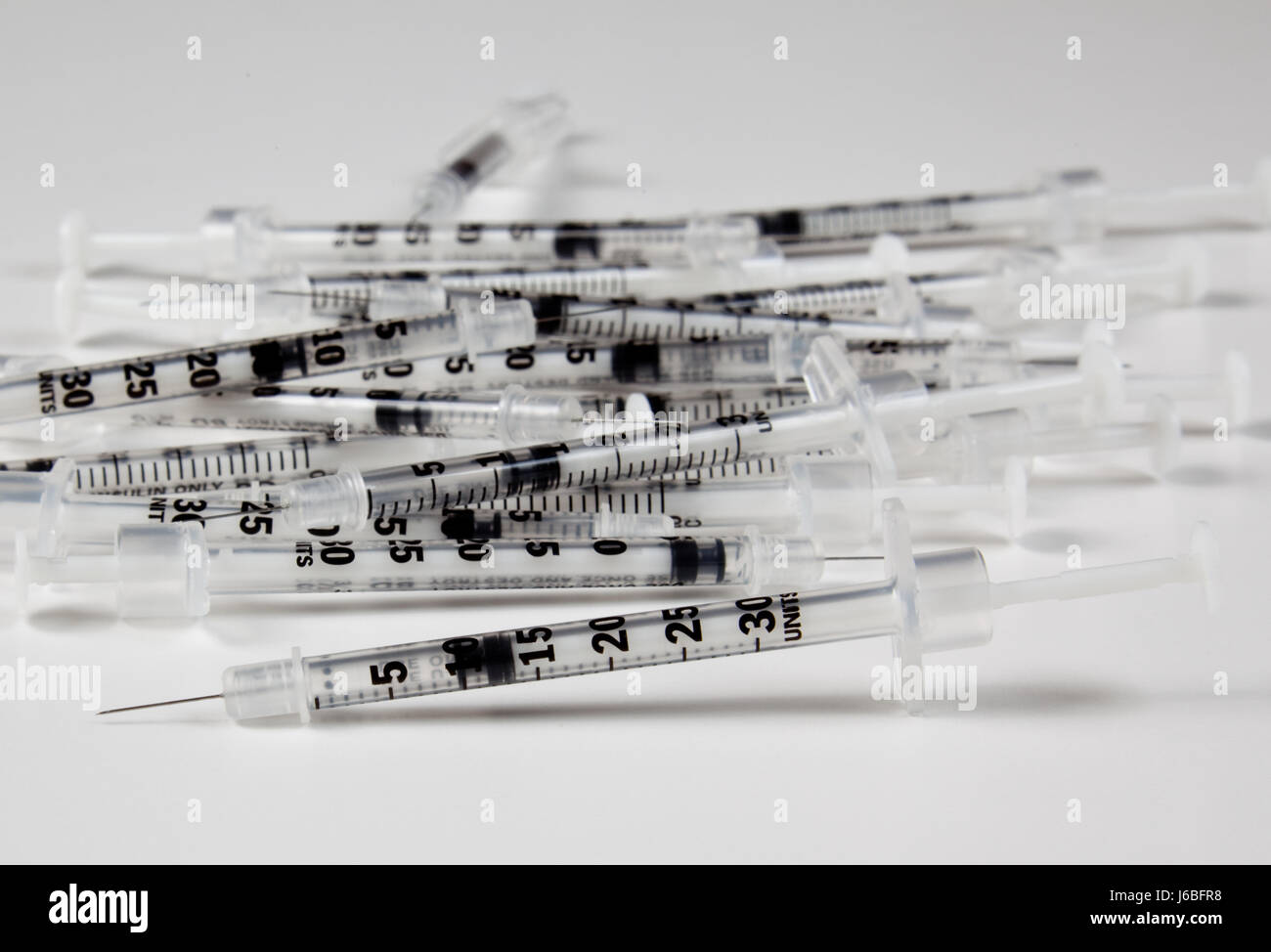 needle injection inject immunize syringe glass chalice tumbler objects ...