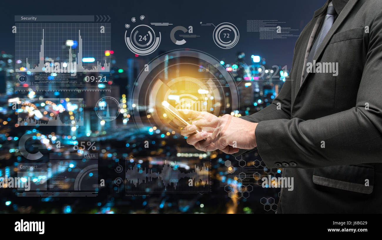Business man suit using smart phone and Technology graphic with blur ...