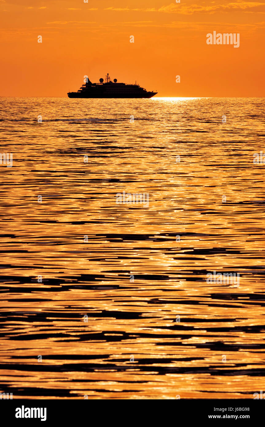 navigation sunset cruise boat ship salt water sea ocean water rowing ...