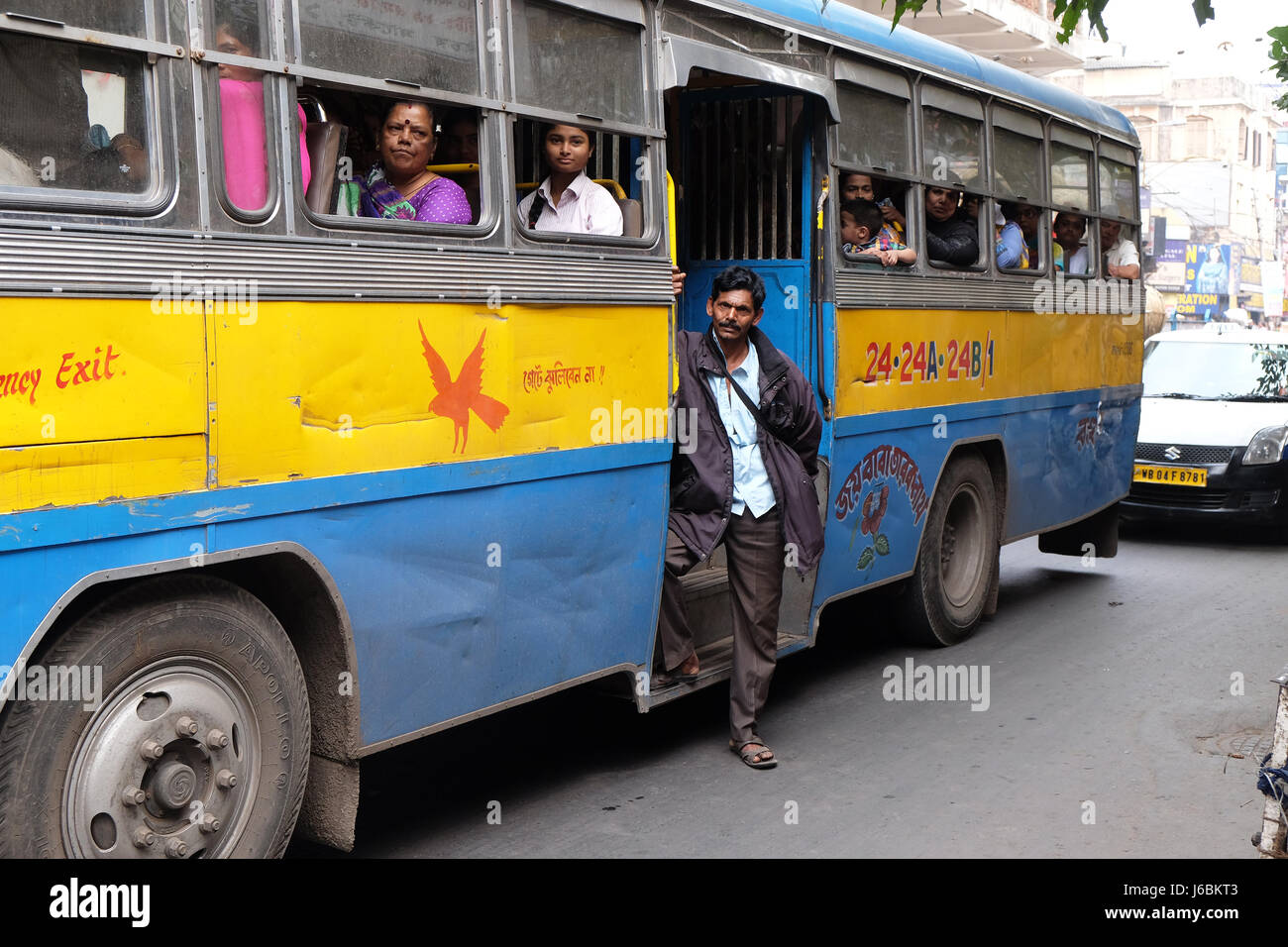 Man in window of bus india hi-res stock photography and images - Alamy