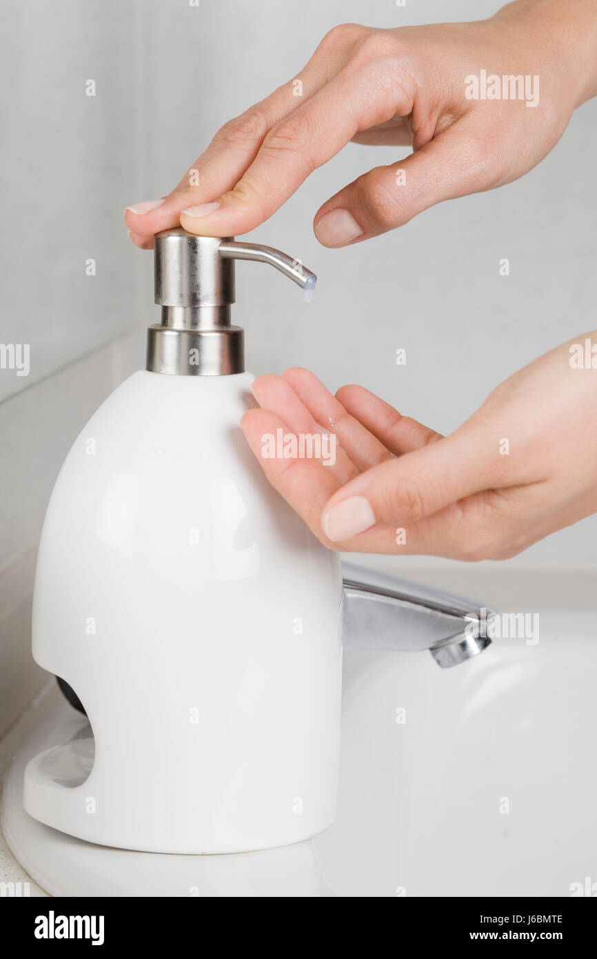 soap from the dispenser on the hand Stock Photo - Alamy