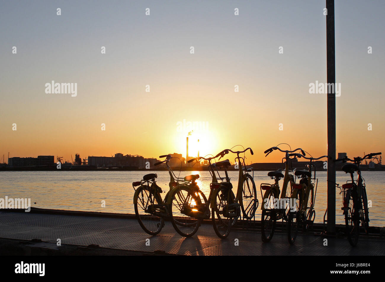sunset at the port Stock Photo - Alamy