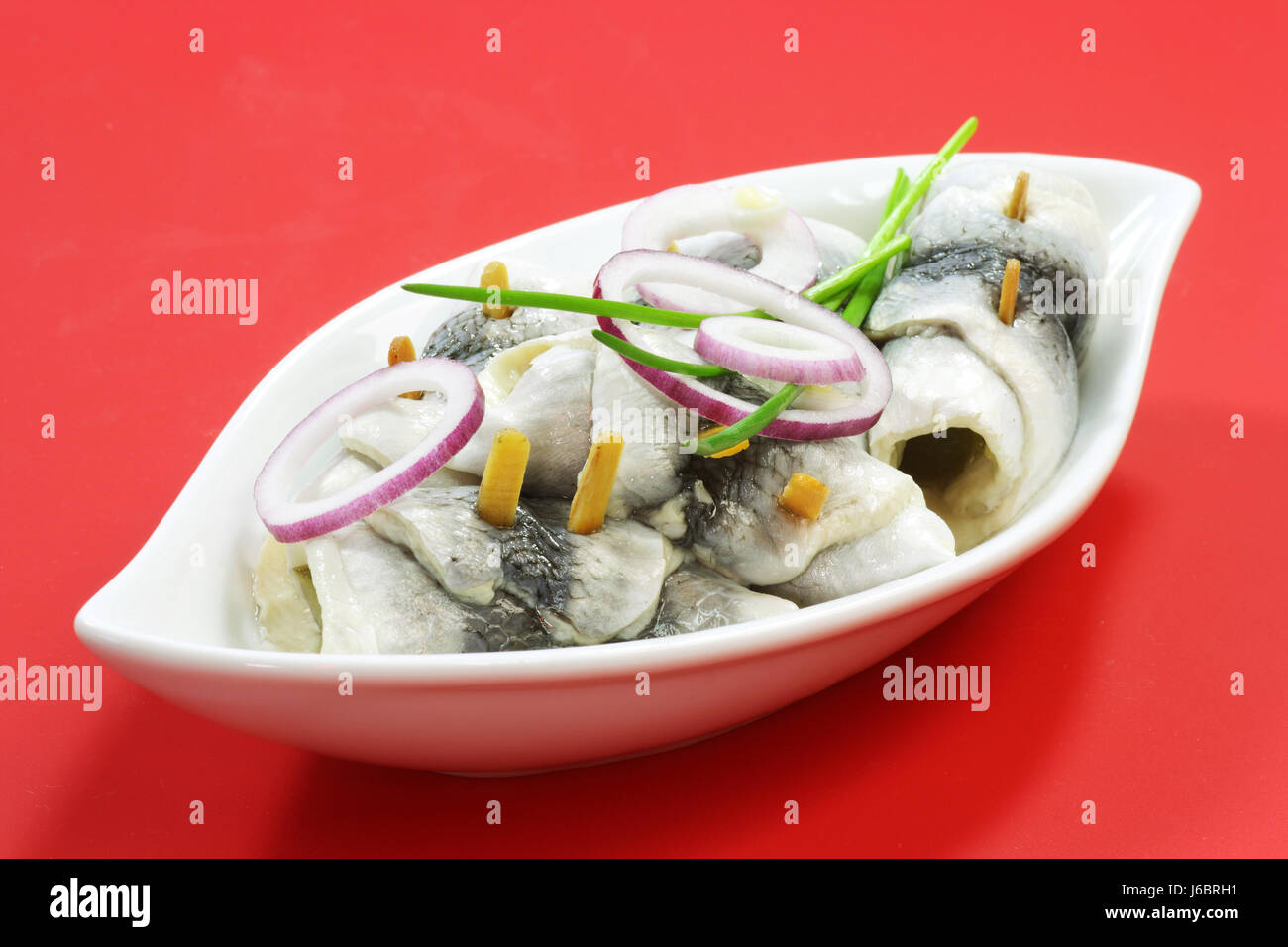 herring fish sour herring rolled inlaid fish snack chives chive dill ...