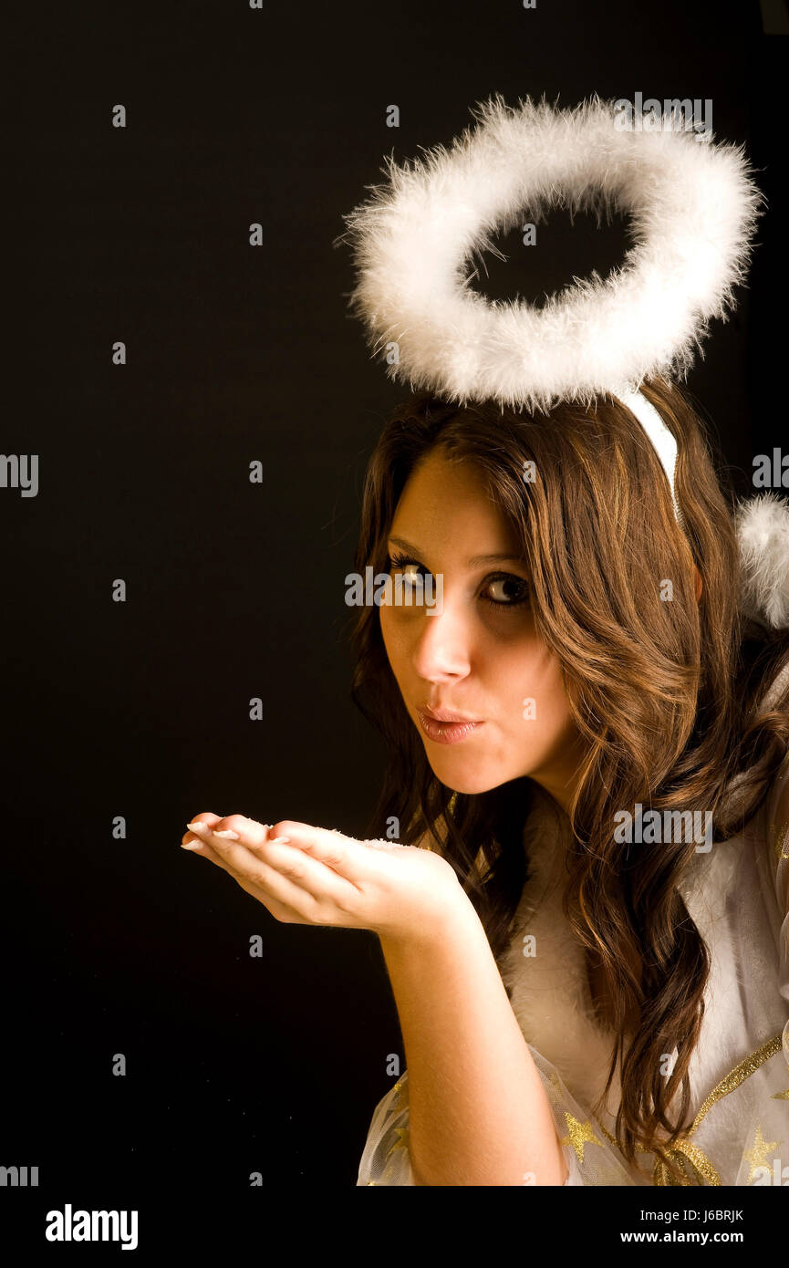 woman hand blow angel angels costume young younger hand hands brown ...