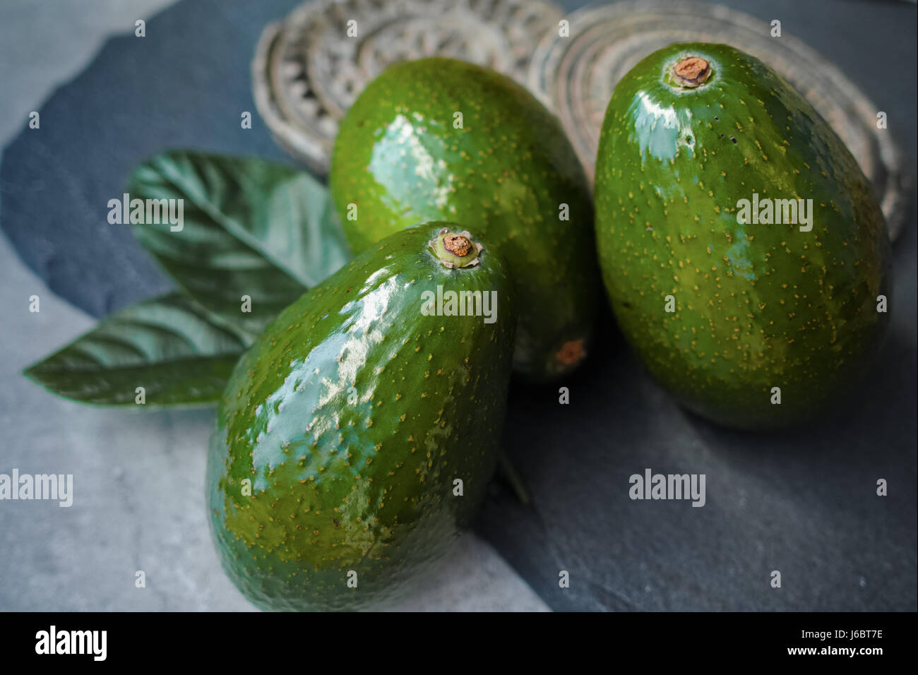 Green ripe tropical vegetable avocados ready to eat Stock Photo - Alamy