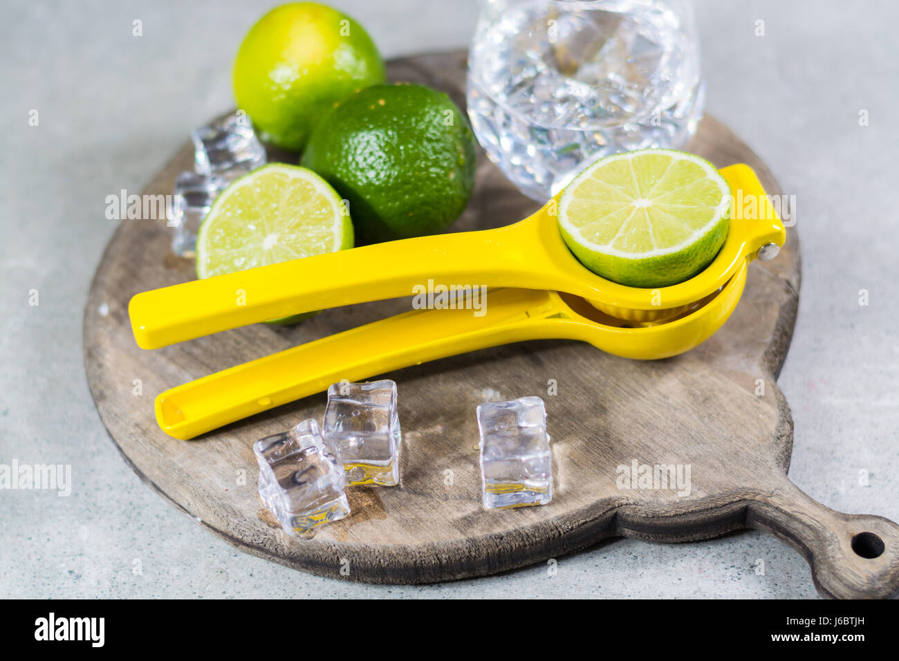 Lime manual press for preparation of cocktails, limes and glass with ...